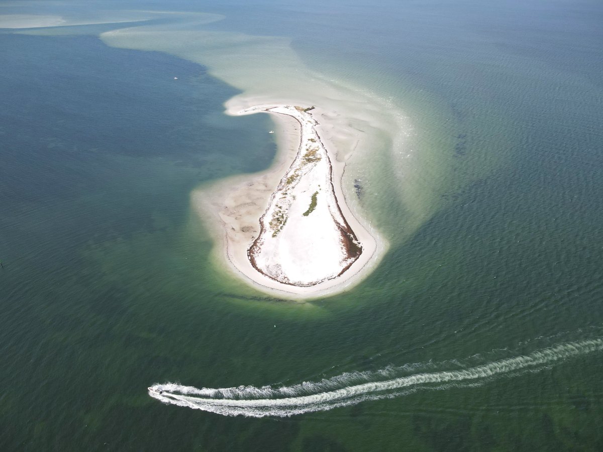 max chesnes times the barren northern tip of three rooker island juts ...