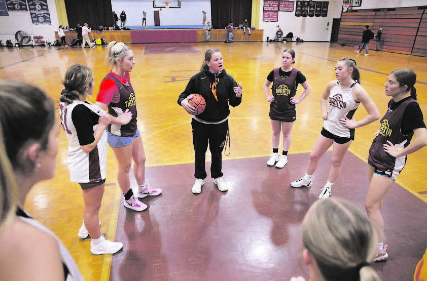 thornton academy coach suzanne rondeau works with her team during a ...