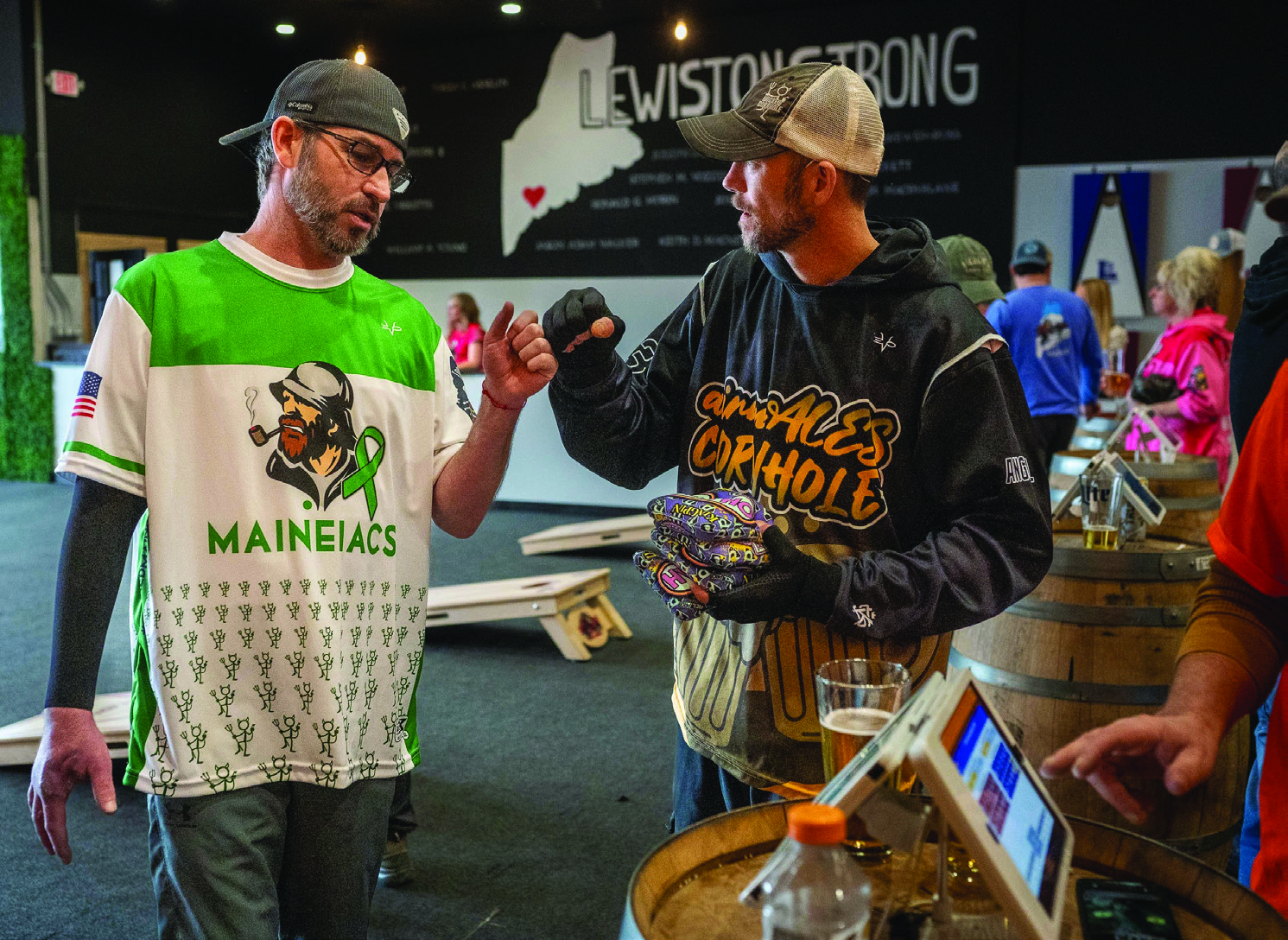 ben dyer left exchanges a fist bump with jeremy angell of south berwick ...