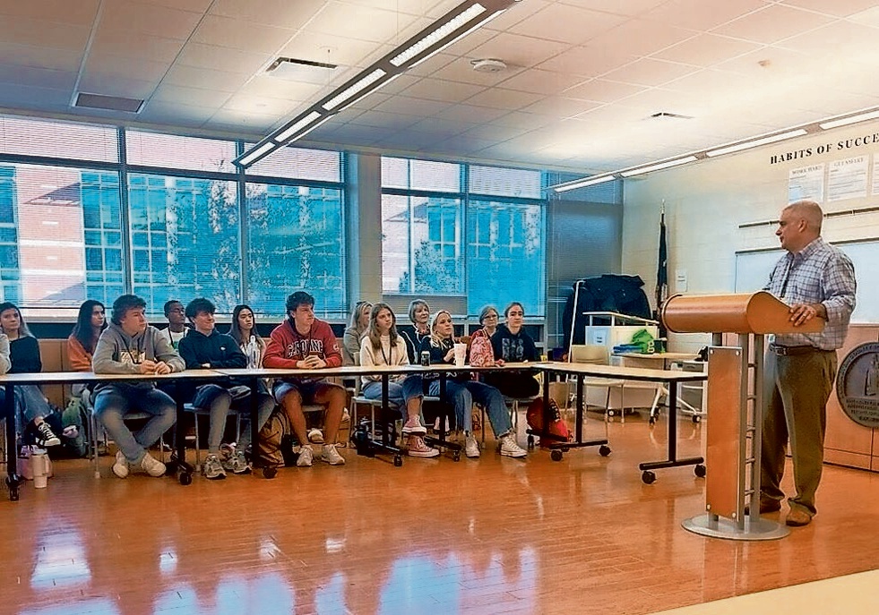LEAH HINCKS/STAFF Michael Burgess addresses his students in a ceremony ...